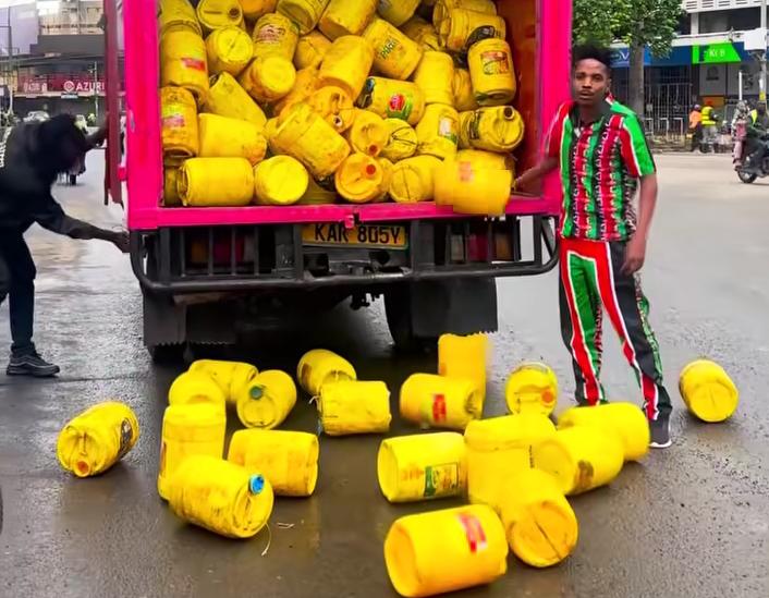 Eric Omondi storms CBD with lorry of empty jerrycans over fuel crisis