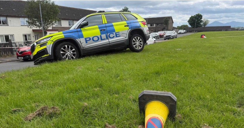 Shot fired as officer struck by stolen police car